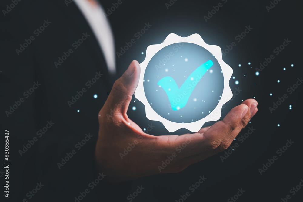 Businessman hand showing signs of Best Service, Quality Assurance ...