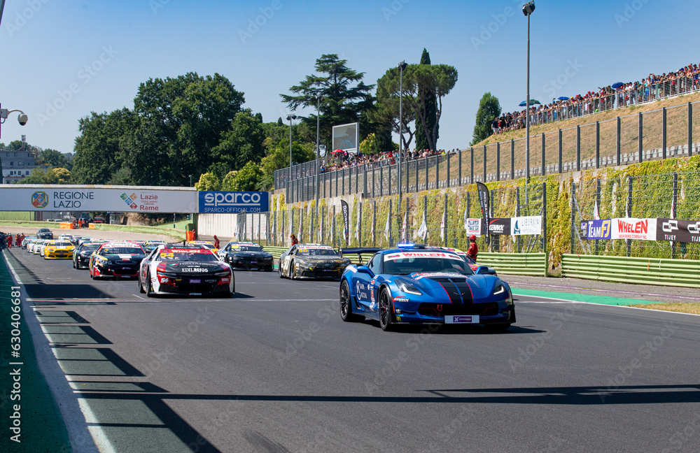 Nascar racing car start, race starting grid with safety car Stock Photo ...