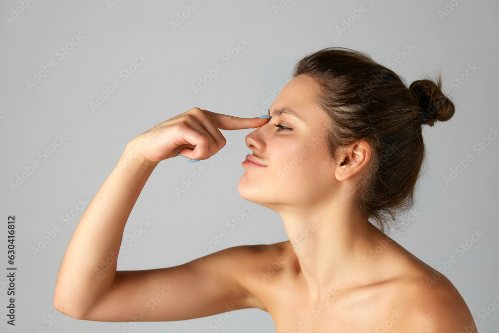 Side view portrait of beautiful young woman, with well-kept skin ...