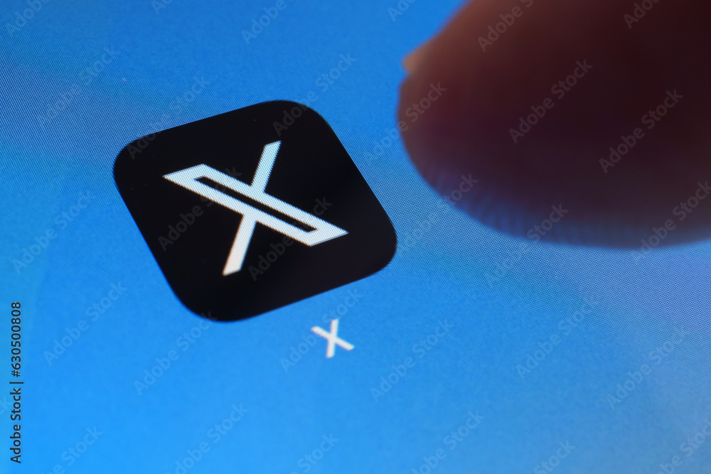Twitter X app logo seen on screen of smartphone. Twitter rebrands as X ...