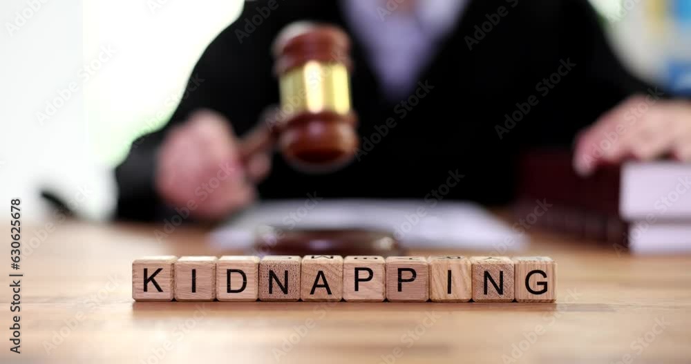 Kidnapping text and judge knocking gavel in court. Court arrests ...