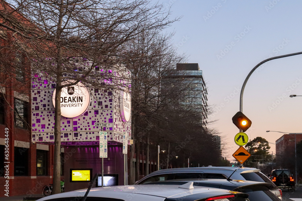 Deakin University waterfront campus at Geelong at night with cars ...