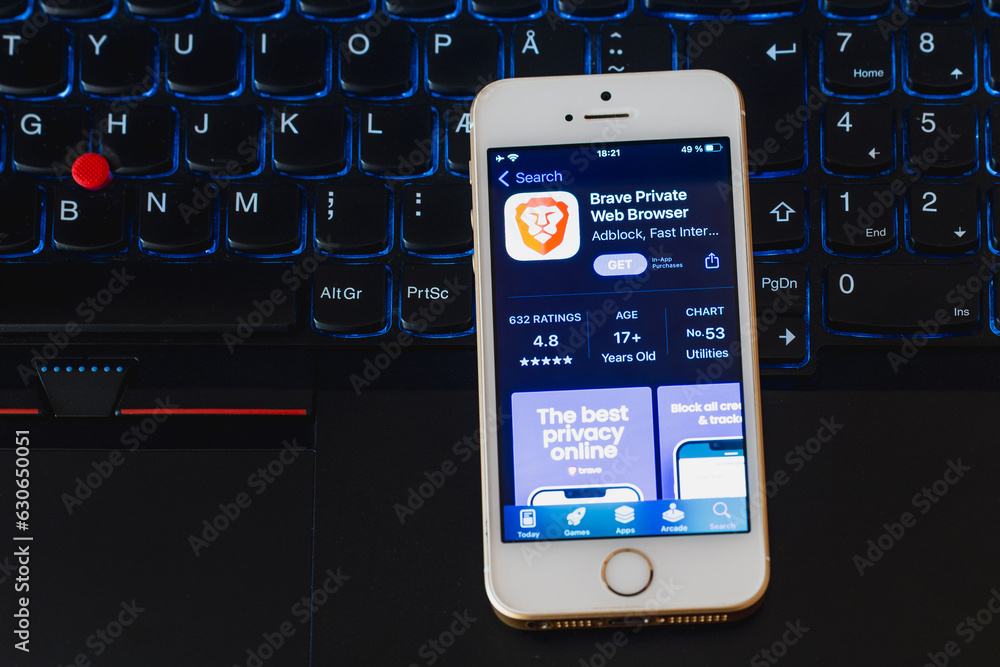 Brave Browser: Fast Adblocker dev app on Smartphone screen.Laptop pc ...