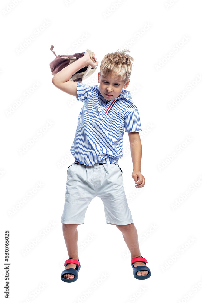 The boy angrily throws his backpack. Stress and unwillingness to learn ...