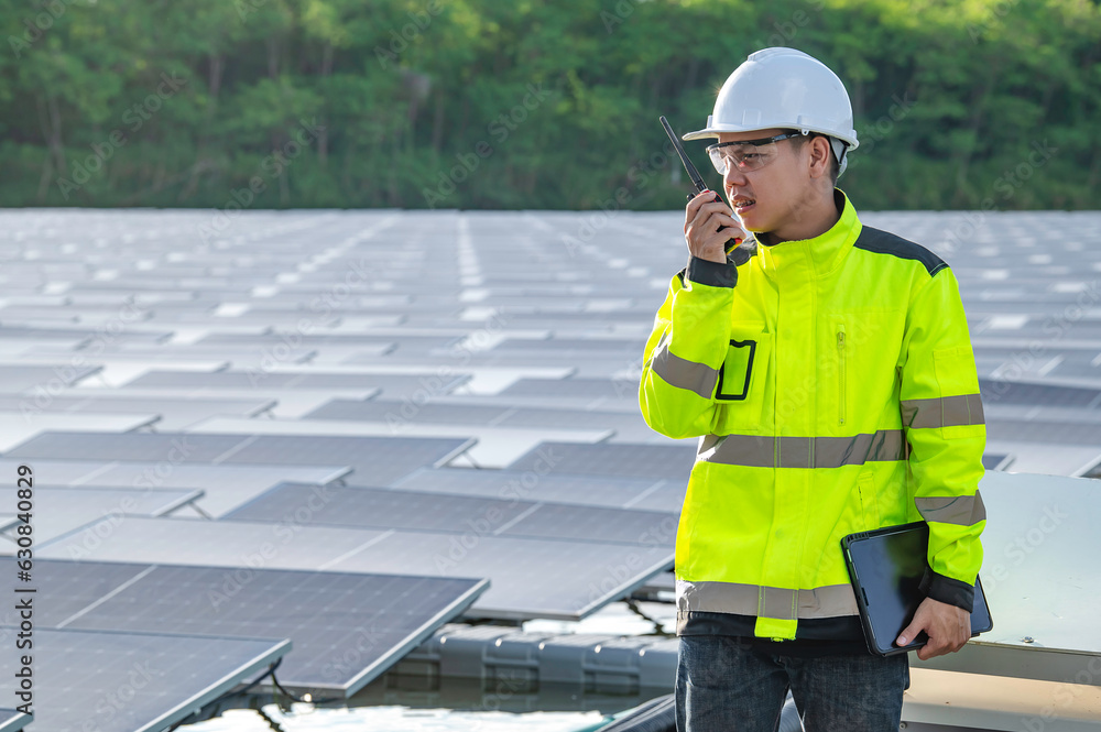Asian engineer working at Floating solar power plant,Renewable energy ...