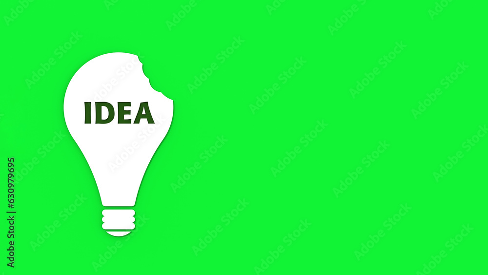 a white bitten light bulb with the inscription idea on a green ...