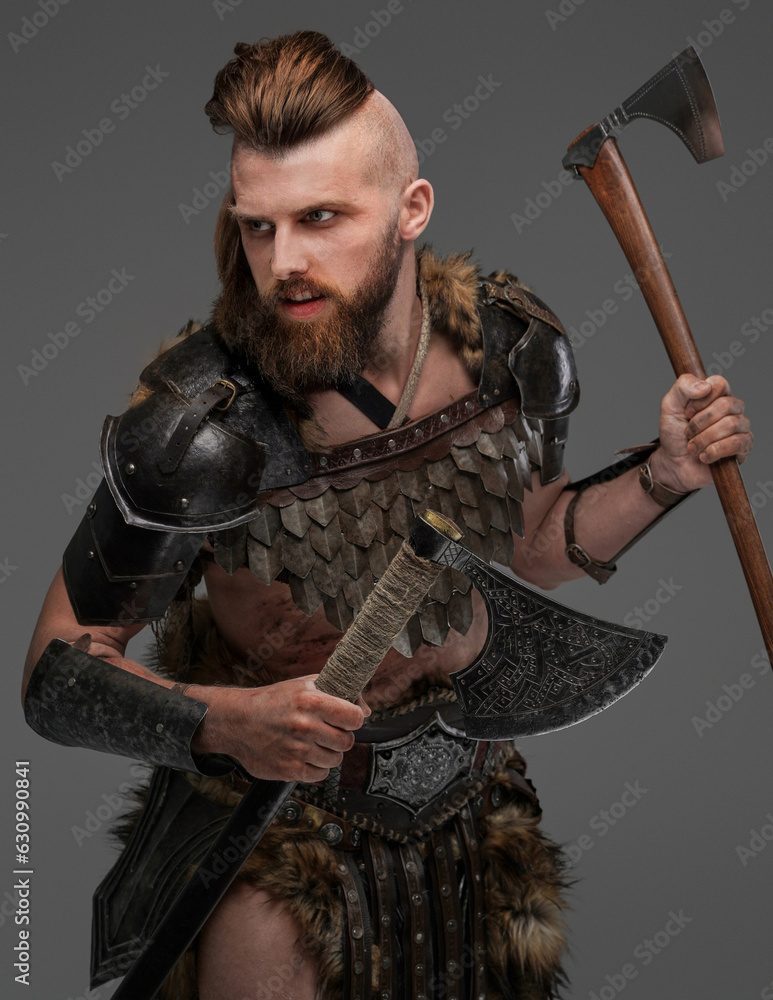 An imposing and rugged Viking man with a bushy beard, clad in animal ...