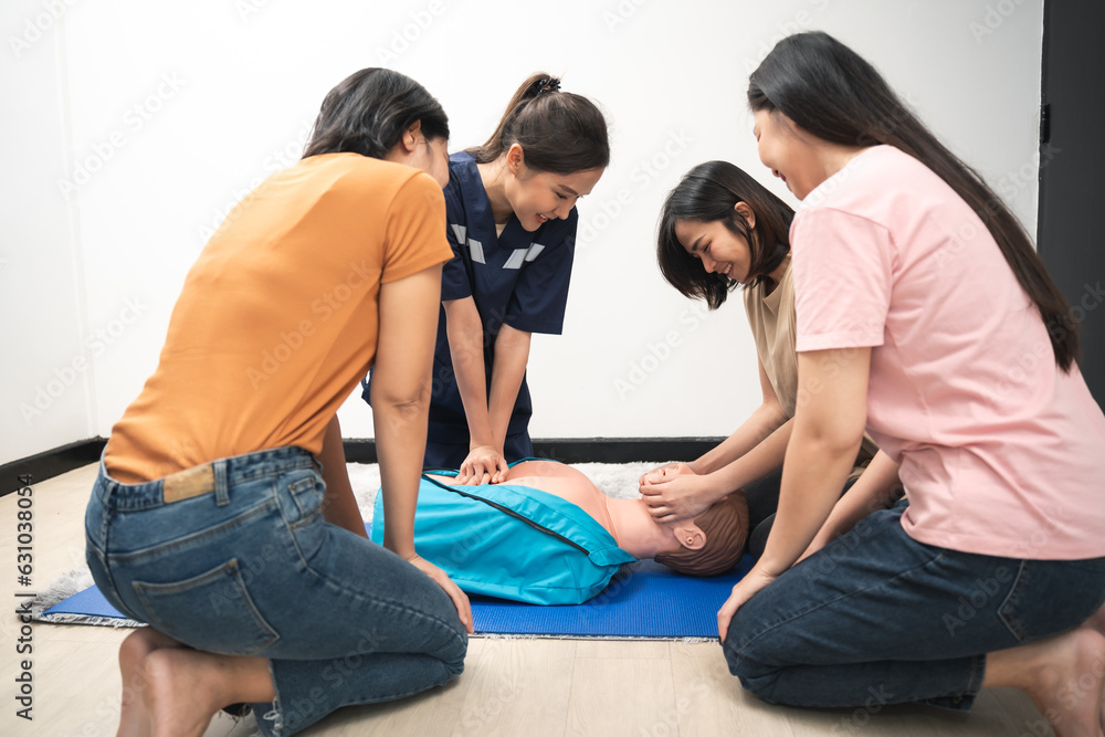 CPR Training ,Emergency and first aid class on cpr doll ...