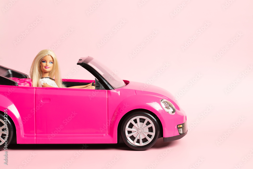 Grodno, Belarus - July 30, 2023: Barbie doll driving a pink car, side ...
