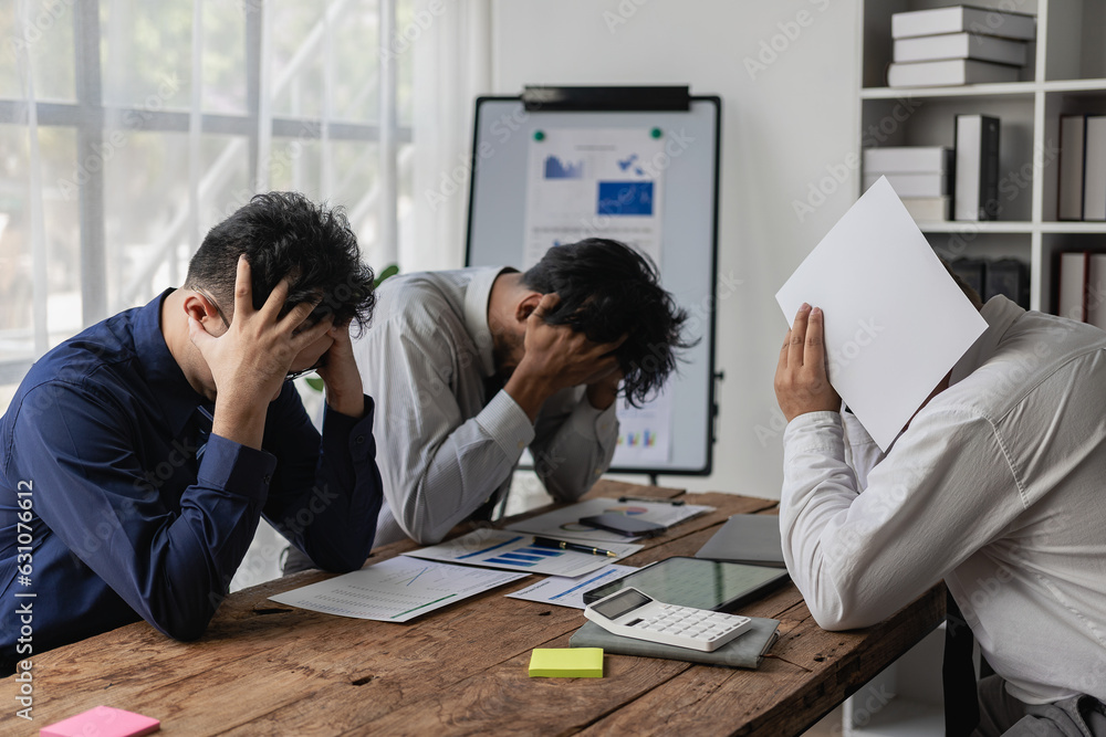 Two asian businessmen feeling tired Upset or sad because of job stress ...
