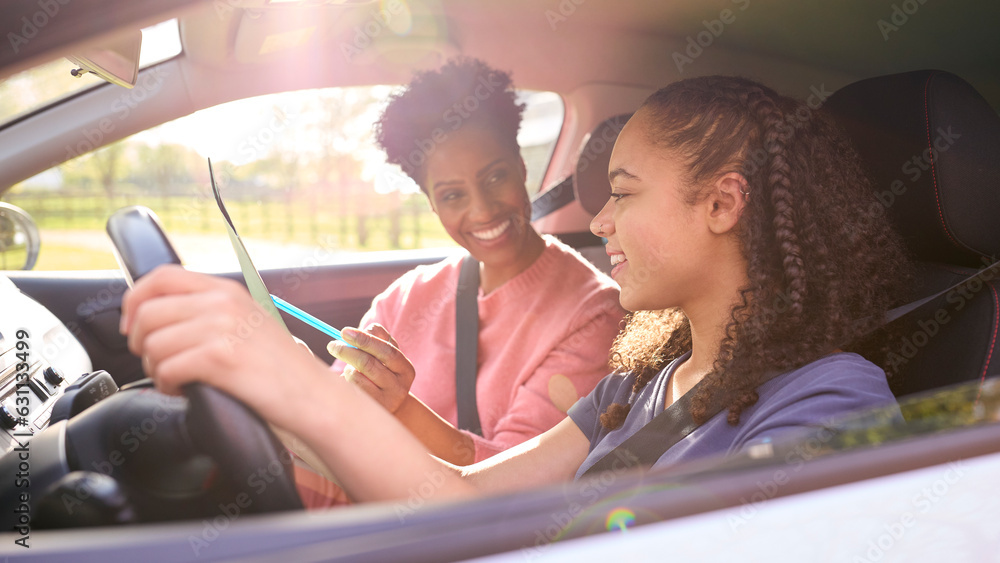 Teenage Girl In Car Having Driving Lesson From Female Instructor Stock ...