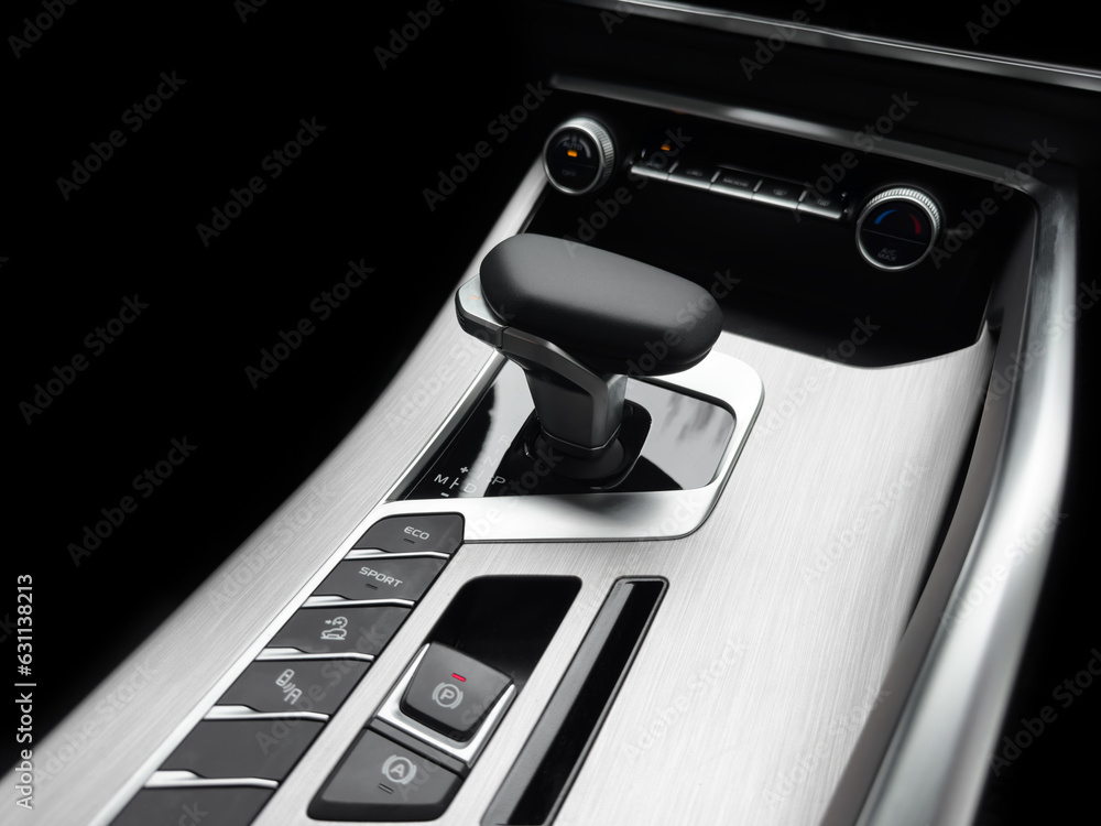 Automatic gear stick of a modern car. Modern car interior details ...