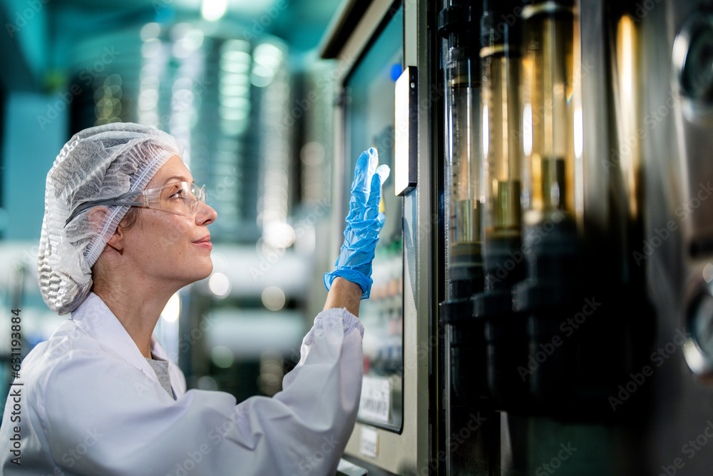 scientist woman worker checking and monitoring the control panel on ...