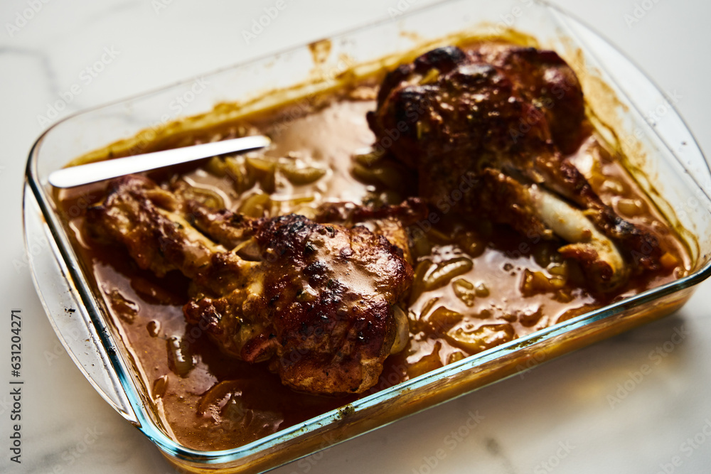 Smothered or stewed Turkey wings in a rectangular baking dish. Roasted ...