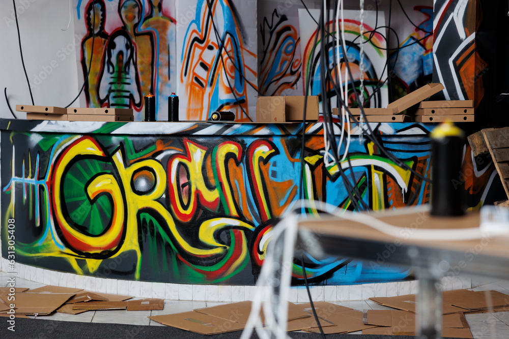 Broken warehouse building with decaying structure covered in rusty ...