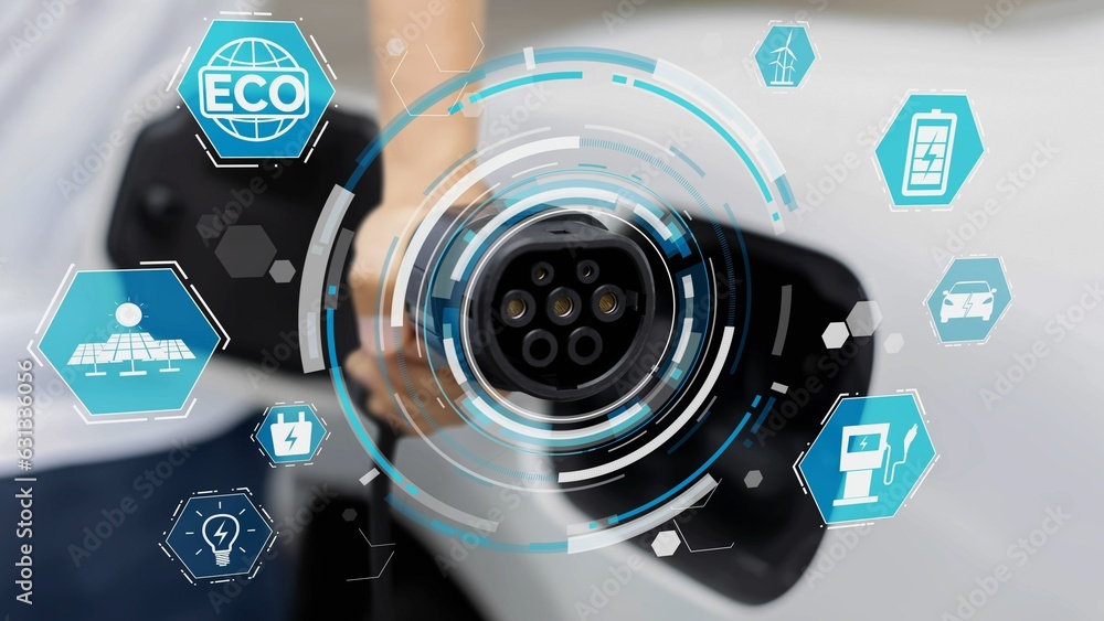 Focus EV charger pointing in front of camera display eco-friendly ...