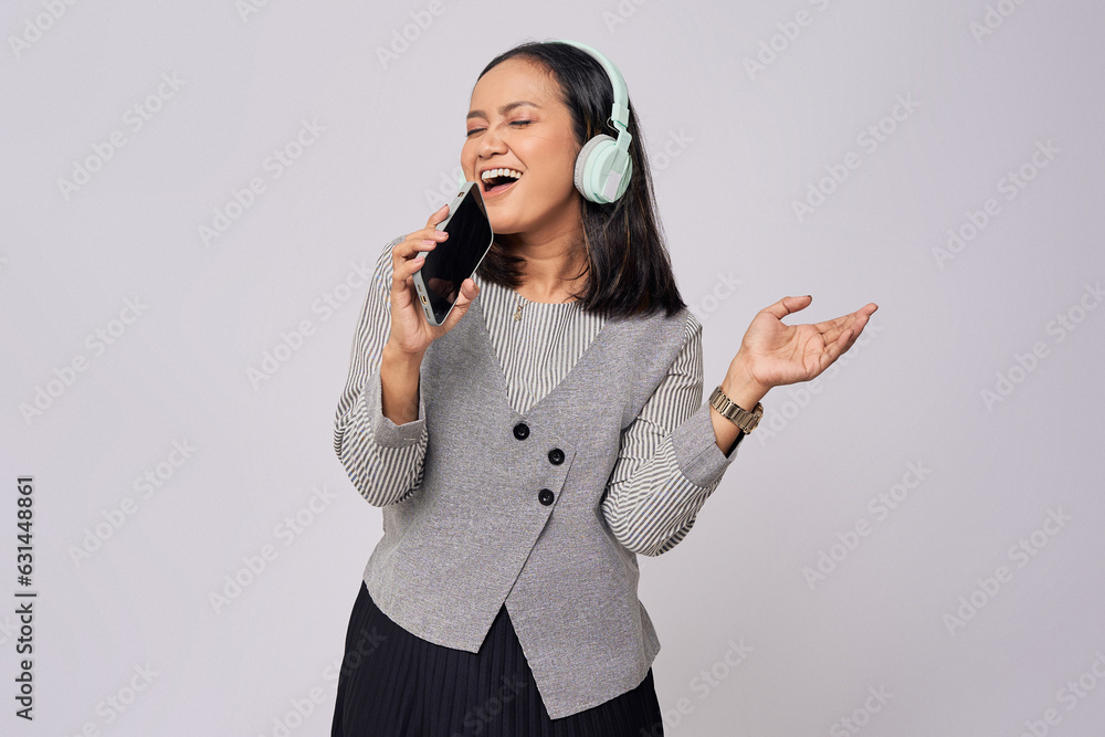 Beautiful young singer Asian woman 20s wearing formal grey shirt ...