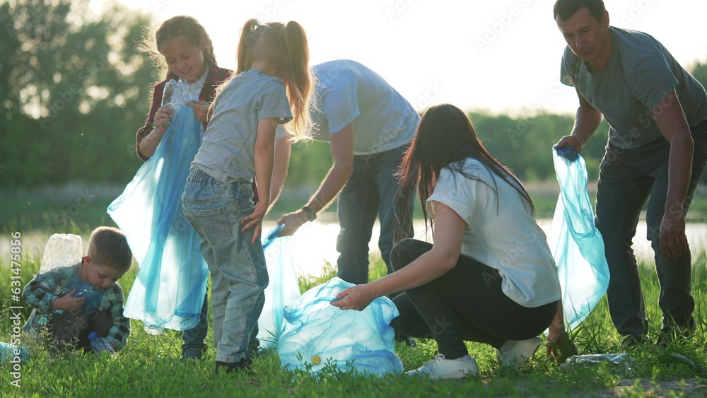 saving nature garbage collection. a group of volunteers save ...
