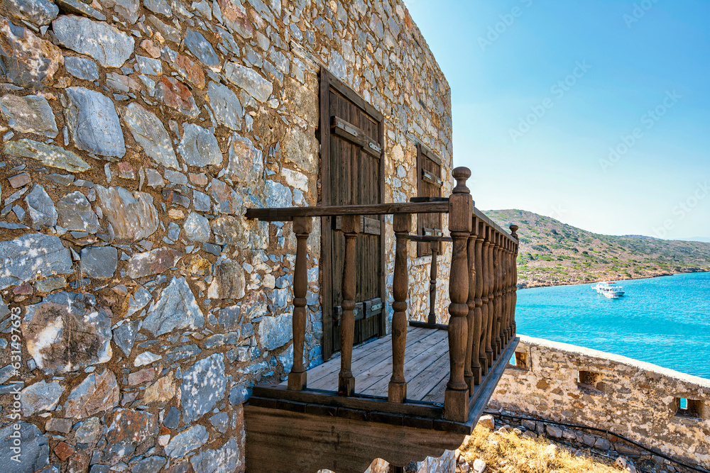 Old house with a balcony on the island of Spinalonga, Crete Stock Photo ...