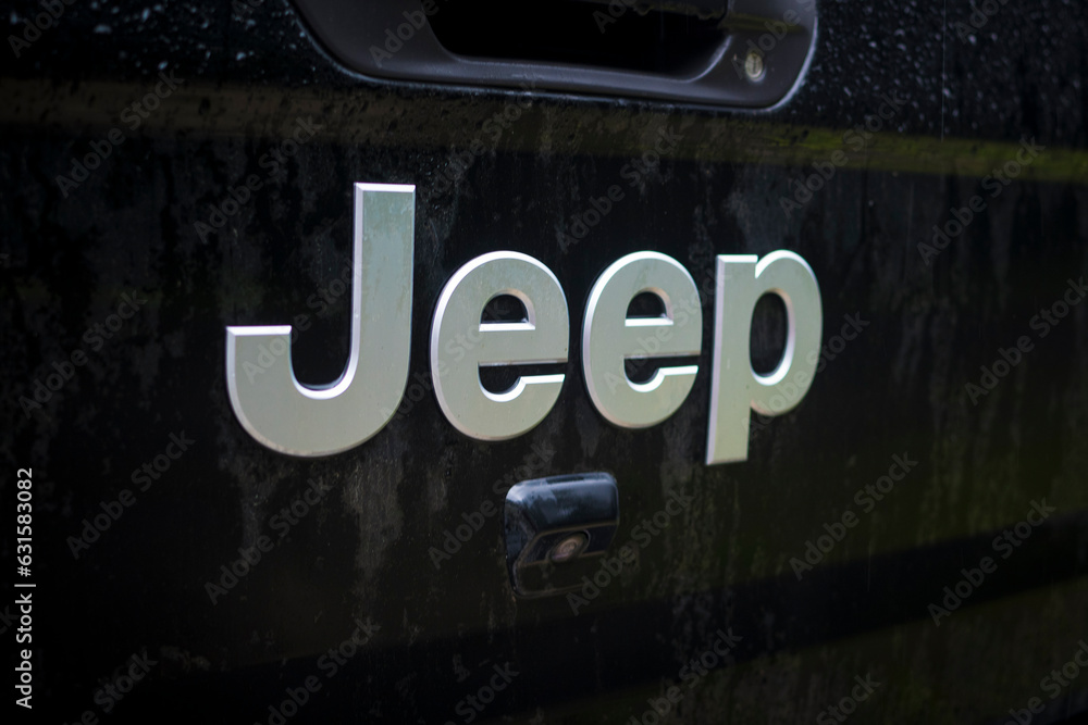 View on Jeep car brand logo on the back of a black truck Stock Photo ...