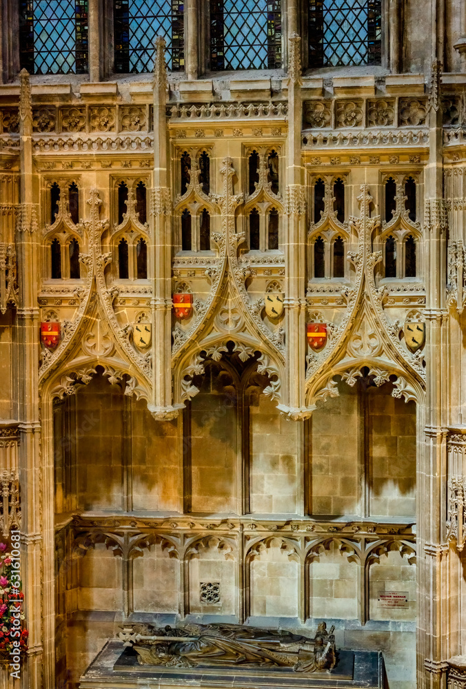 Ornate interior wall and window detail above a tomb in Canterbury ...