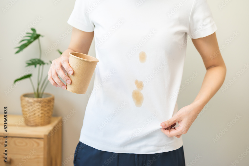 Cloth stain, disappointment asian young woman clumsy with hot coffee ...