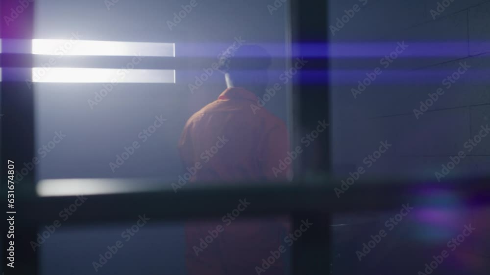 Male prisoners fight in prison cell. Two inmates quarrel and start ...