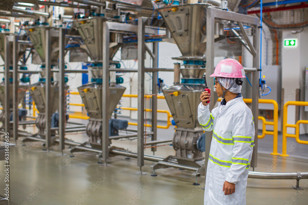 Male engineers sound protection and uniform staff.Hand holding portable ...