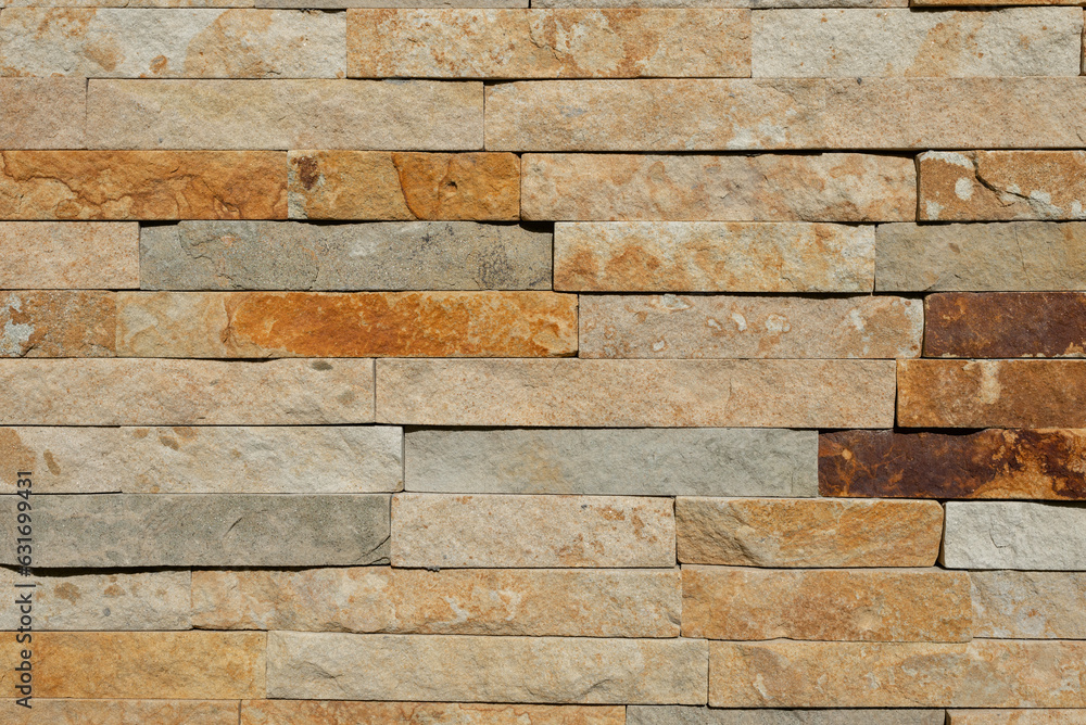 Modern authentic beige, brown and gray stone masonry wall texture ...