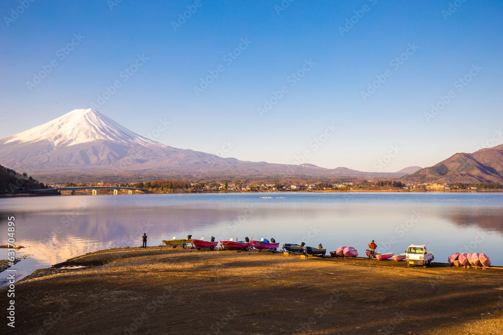 Fujisan mountain reflection on water with boat morning sunrise ...