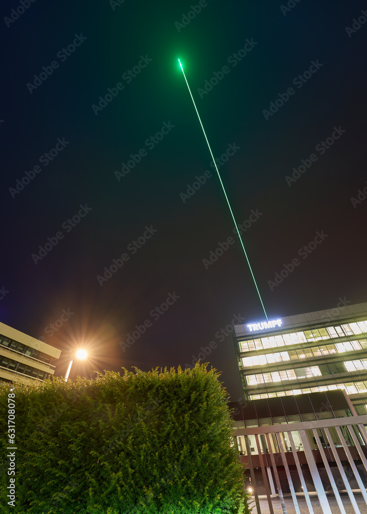 Laser beam in green. Trumpf Tool and machine technology, celebrates its ...