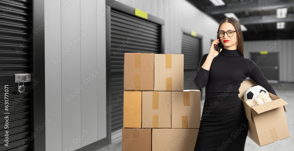 Woman near storage room. Businesswoman speaks on phone. Girl brought ...