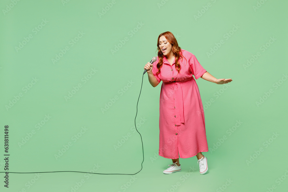 Full body singer caucasian young chubby redhead woman wears casual ...