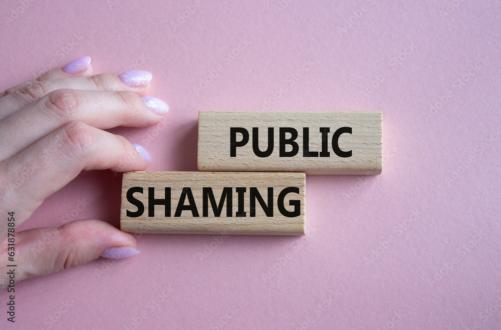 Public Shaming symbol. Concept word Public Shaming on wooden blocks ...