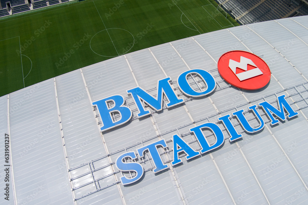 An overhead aerial shot of the logo and the green soccer field on top ...