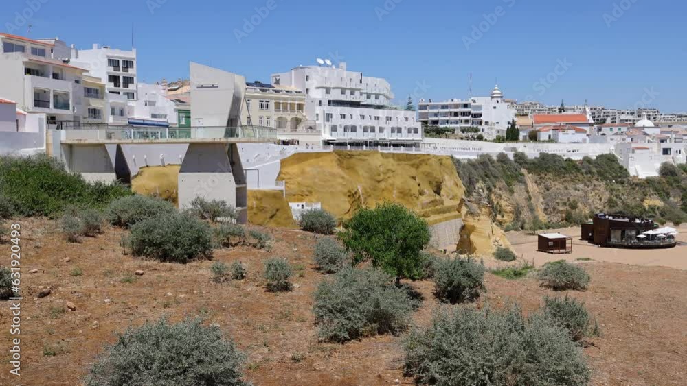 Footage of the beautiful beach front of Albufeira in Portugal, showing ...
