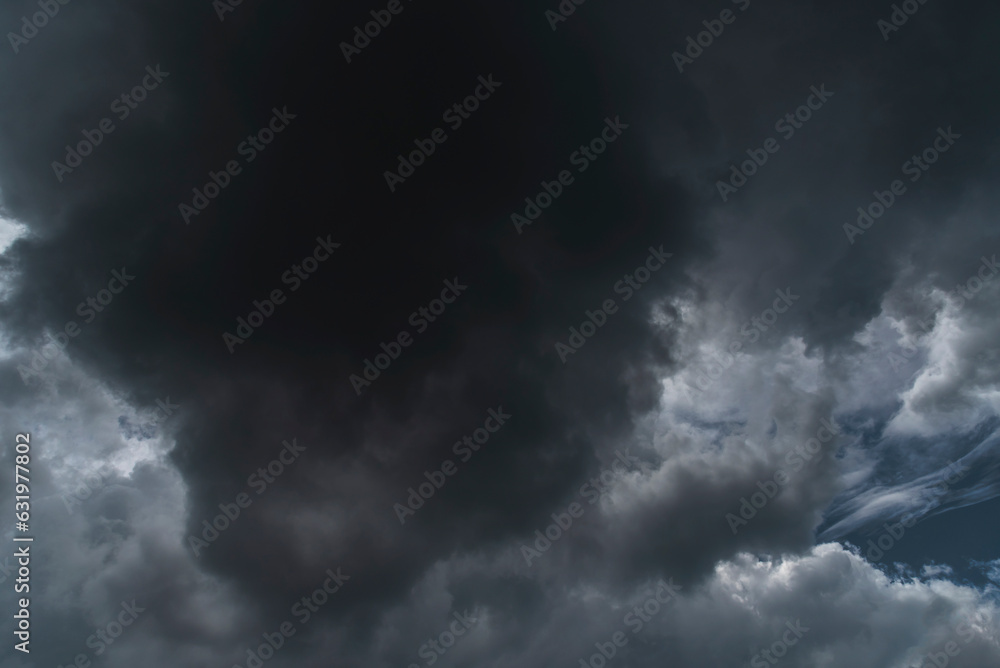 Dramatic dark storm thundercloud rain clouds on black sky background ...