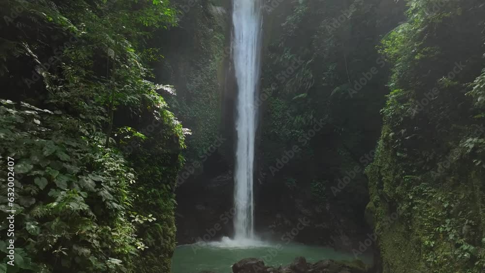 Drone shoot. Waterfall hidden in tropical rainforest jungle, falling ...