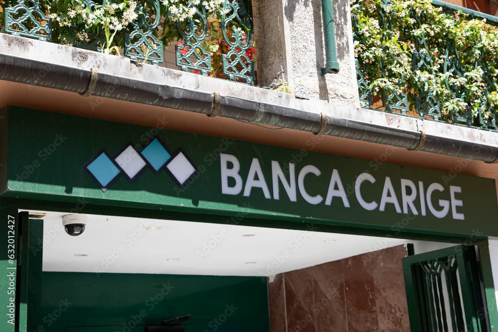 Banca Carige logo brand and text sign bank branch signage on wall ...
