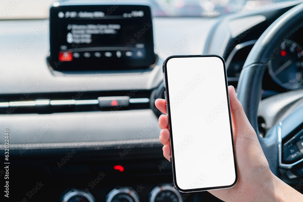 Woman sitting in a private car and hand holding smartphone mockup of ...