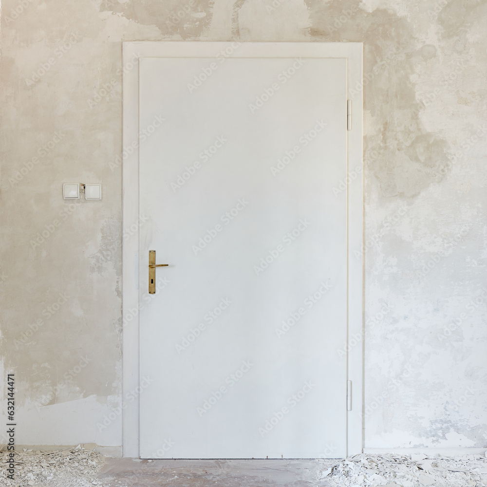 The room is prepared for painting, the old plaster is torn off and the ...