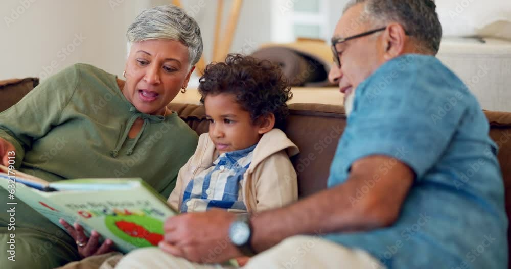 Grandparents, child and reading books on sofa for learning, language ...