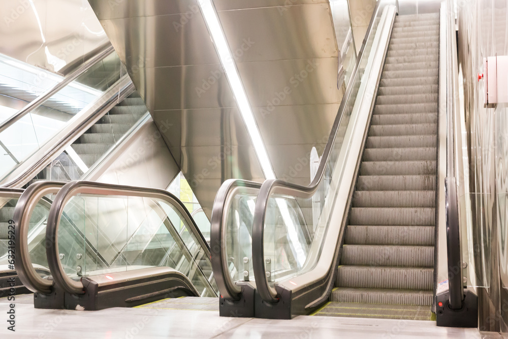 Line escalators with metal coating Stock Photo | Adobe Stock