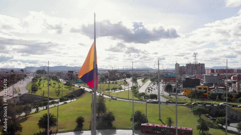Colombian flag in the background you can see the city of Bogota, with a ...