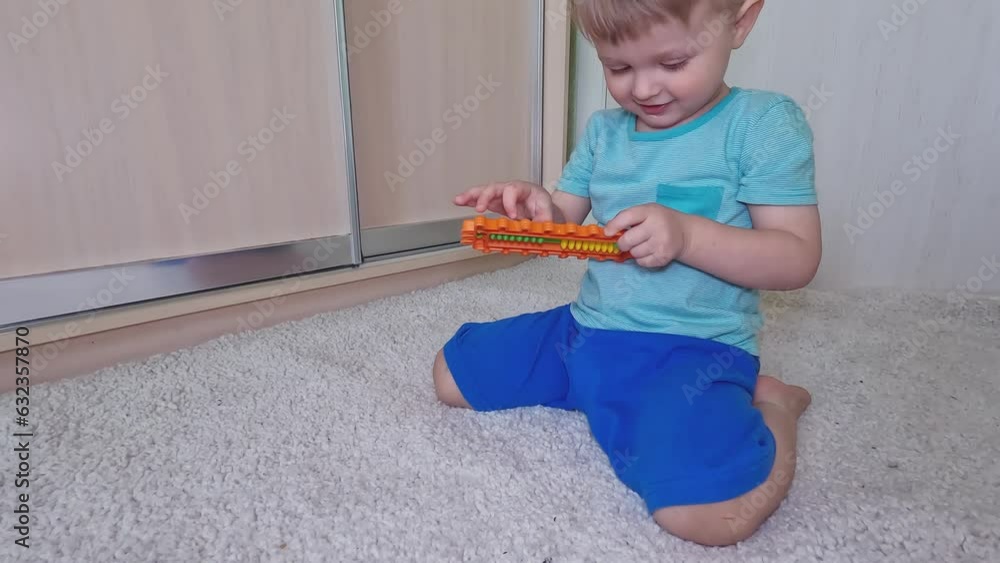 Clever child plays with abacus. Educational toys. Concepts for learning ...