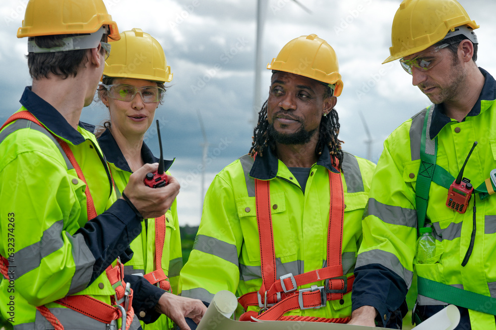 Smart professional engineers working in fieldwork outdoor. Workers ...