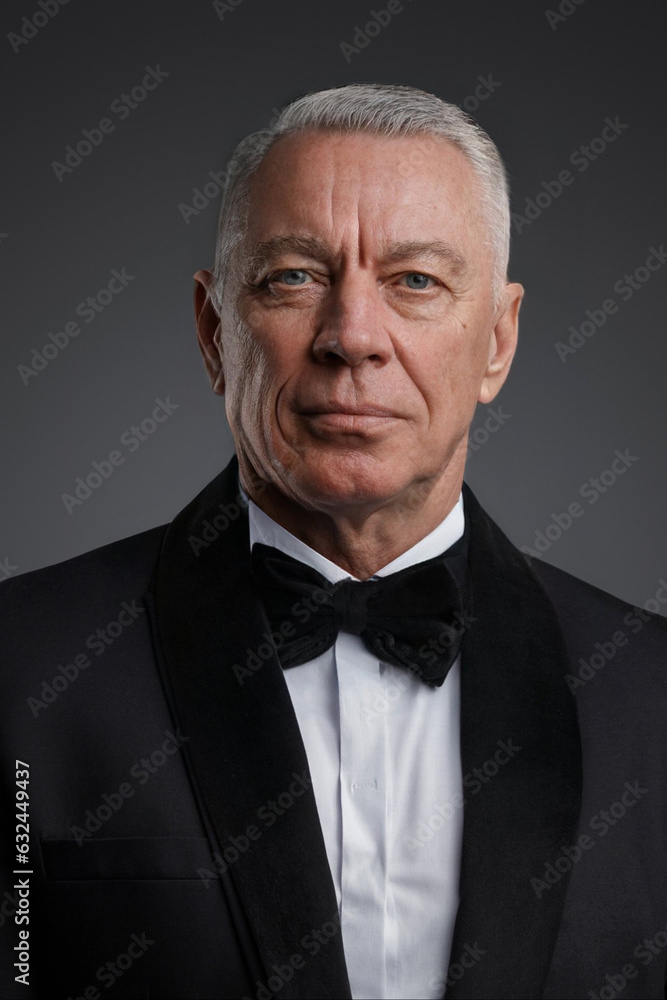 Distinguished older gentleman exudes confidence in this photo, dressed ...