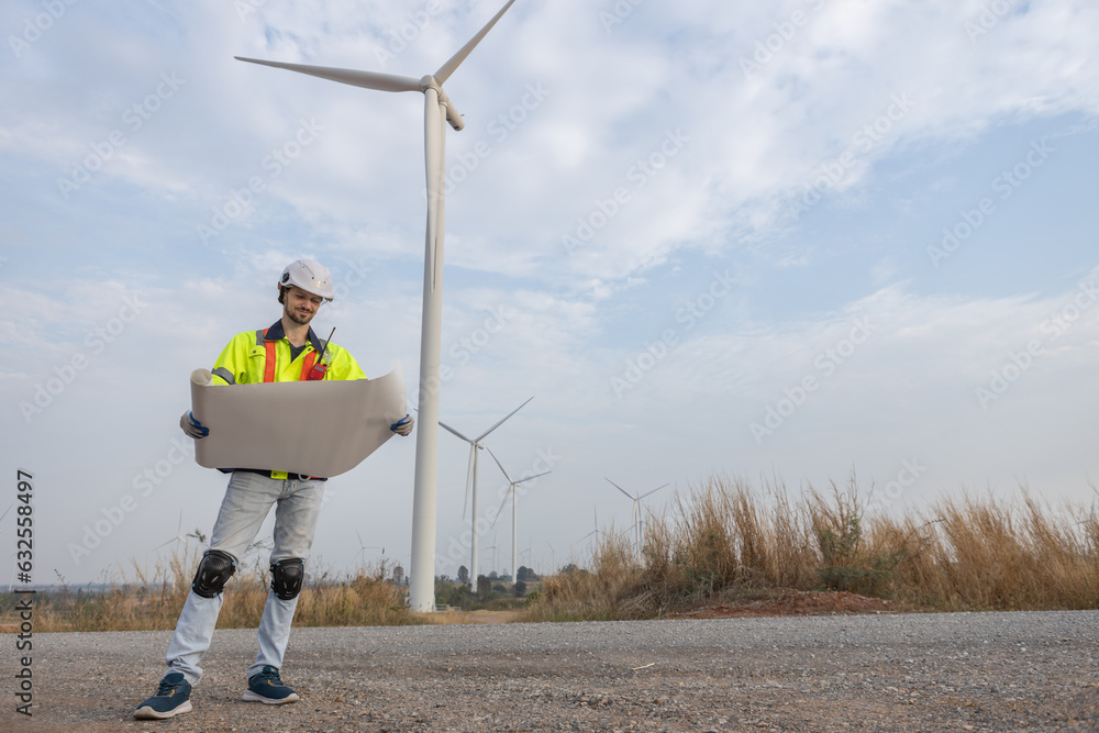 man engineer worker wearing safety uniform holding and reading ...