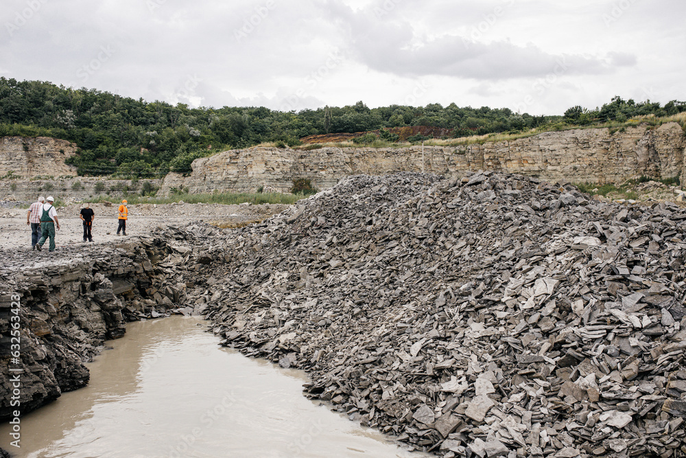 carrying out work in a quarry where minerals are extracted with the ...