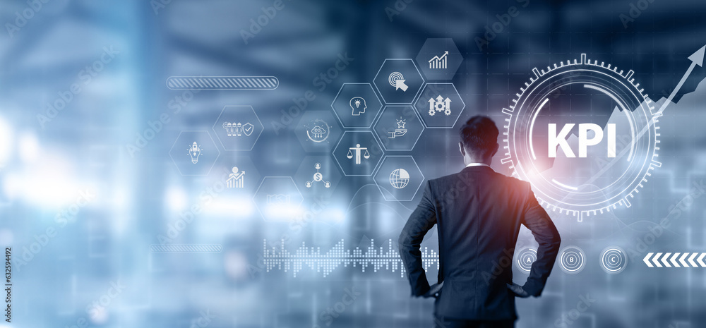 KPI, Key Performance Indicator. Businessman planning and monitoring KPI ...